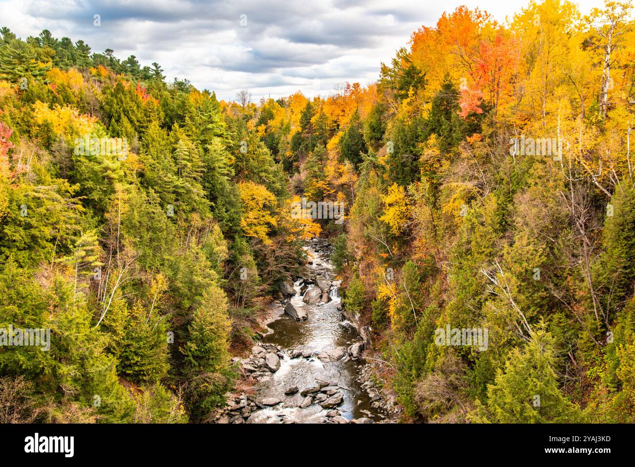 Coaticook, Canada - Oct. 12 2024: Colorful autumn season in Parc de la ...