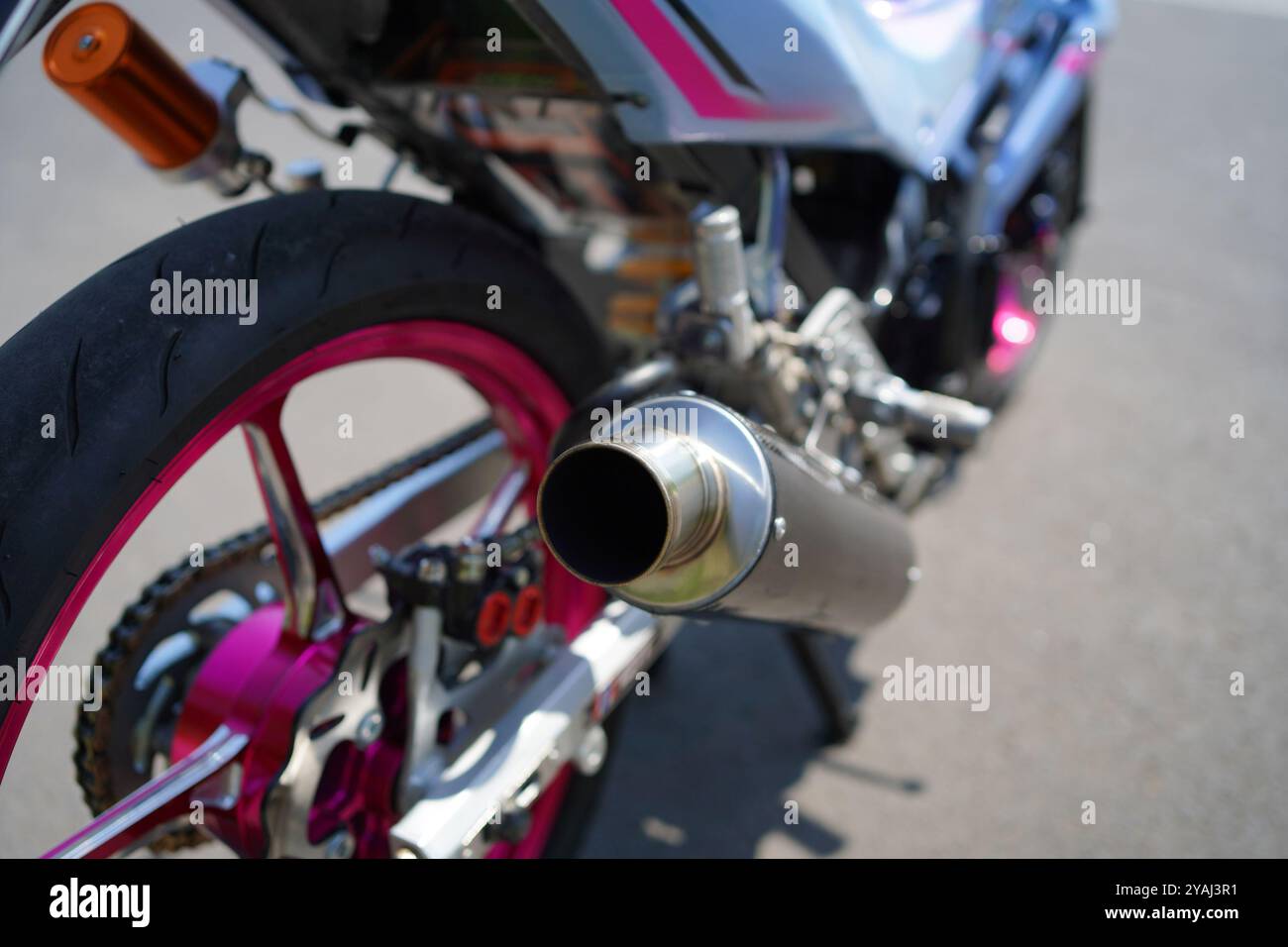 closeup, 4-Stroke underbone motorcycle racing exhaust Stock Photo - Alamy