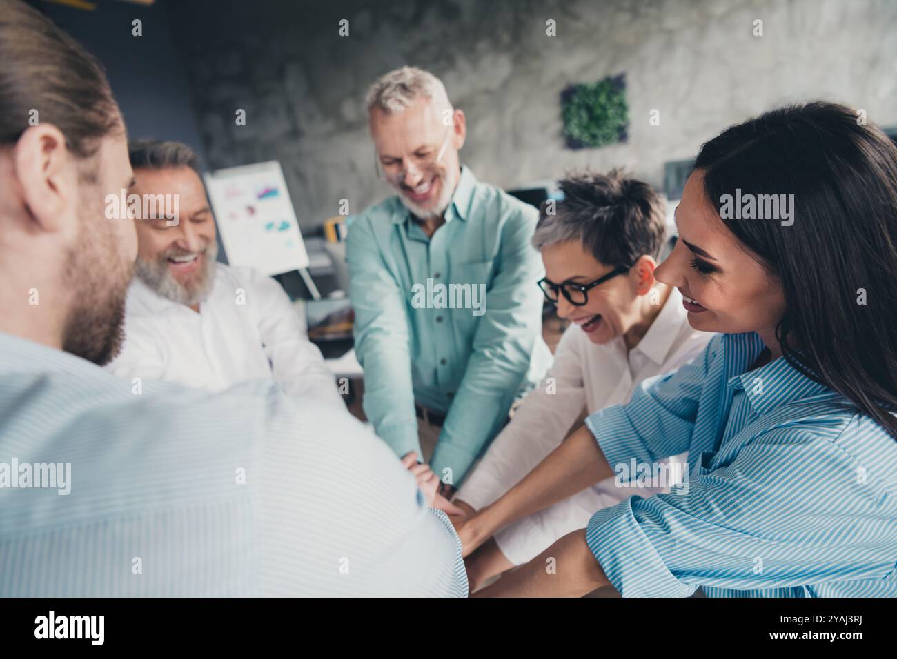 Photo of teamwork startup partners teambuilding hold hands comfortable nice creative startup ...