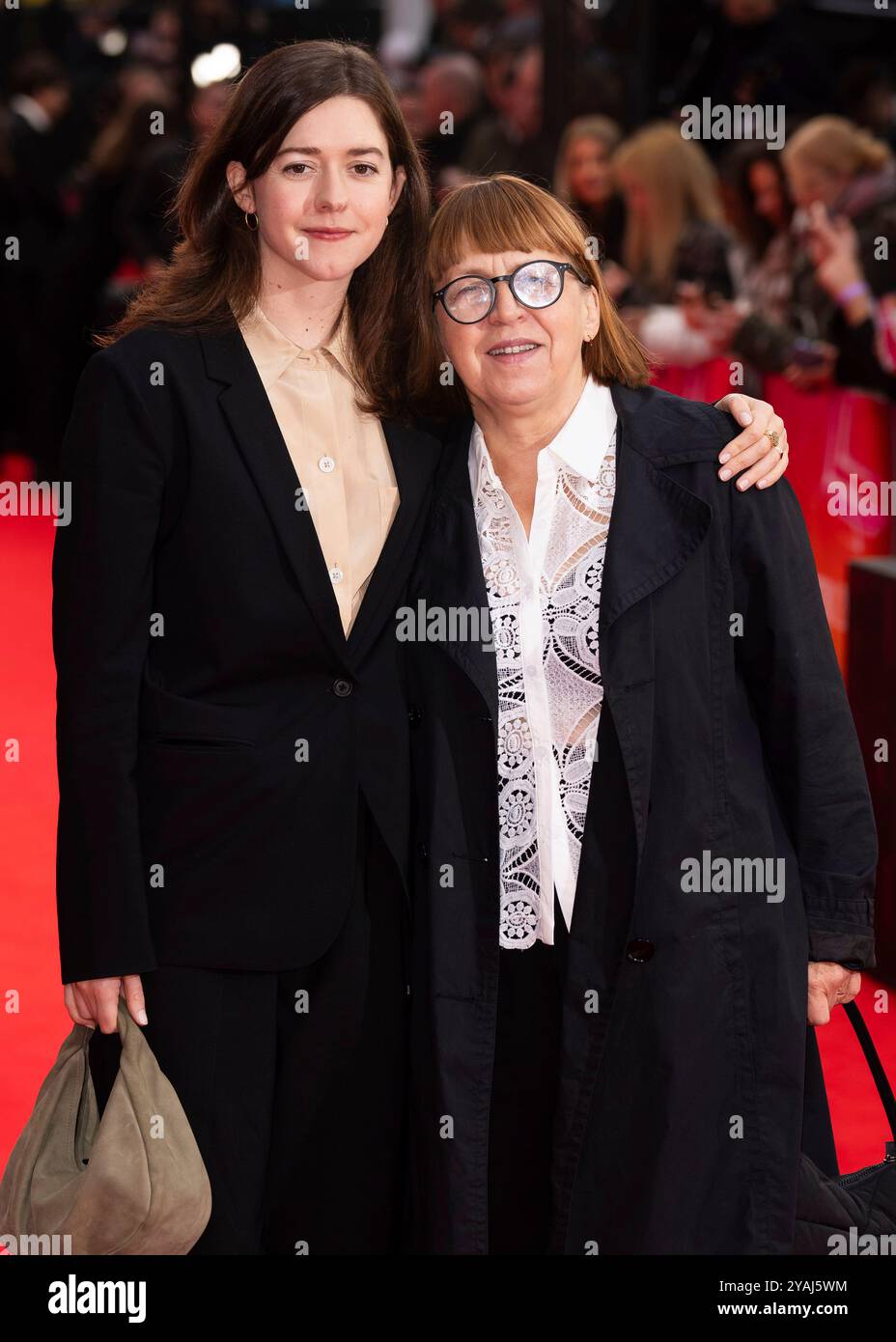 Ewa Puszczynska, left, and Ali Herting pose for photographers upon ...