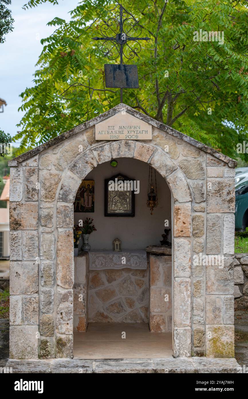 religious Greek orthodox church shrine to saints outside of the church ...