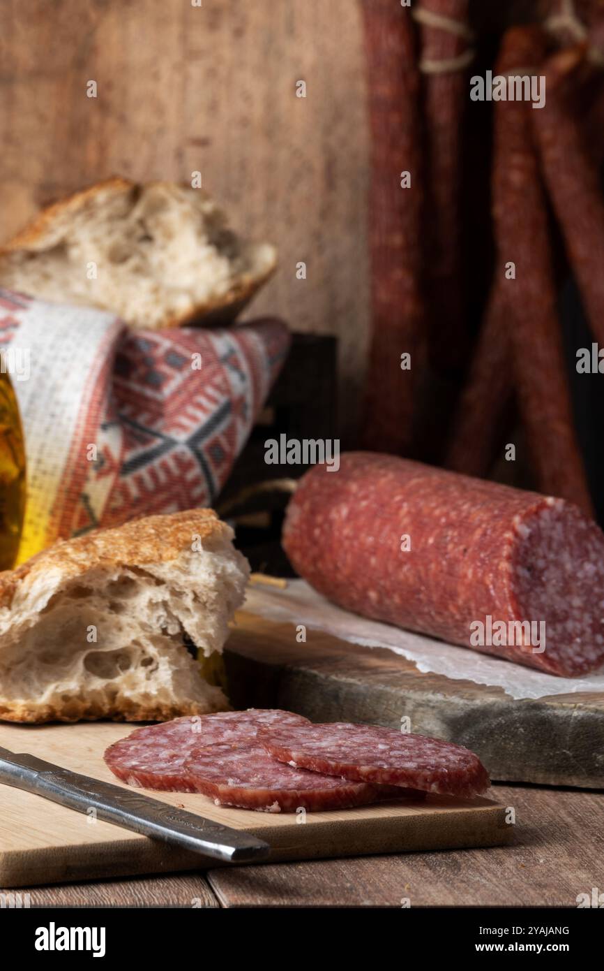 Salami nutrition background, meat production, food industry Stock Photo ...