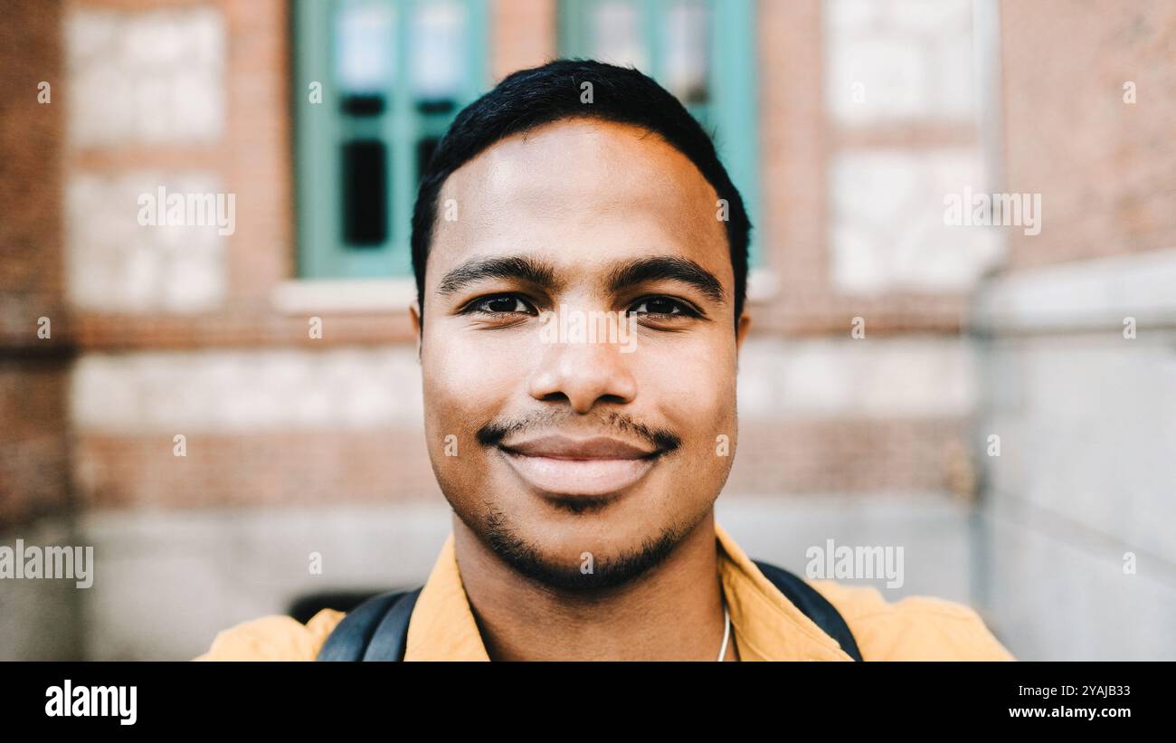 Black young man student smiling on camera. Portrait of African student ...