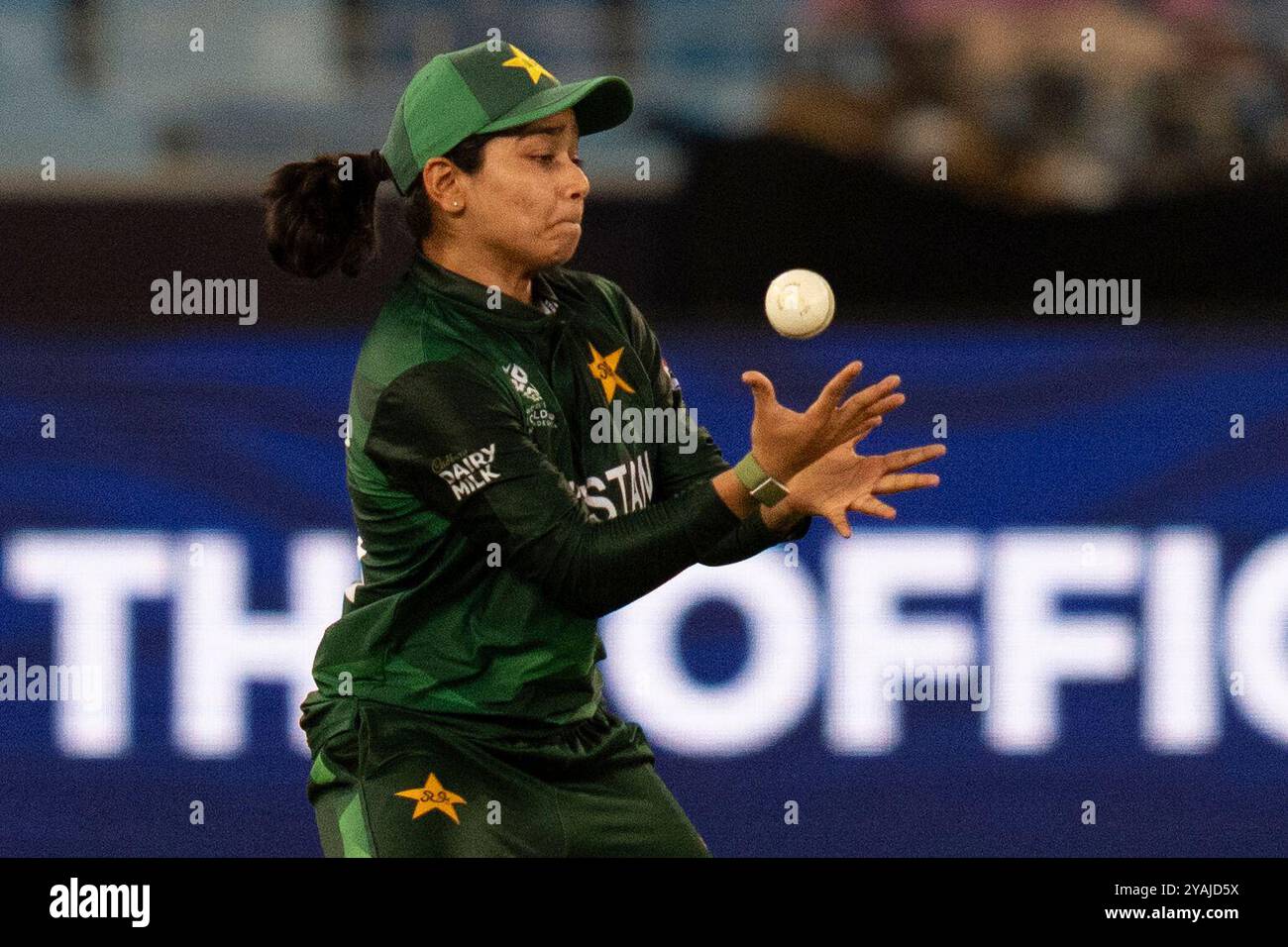 Pakistan's captain Fatima Sana takes the catch to get the wicket of New ...