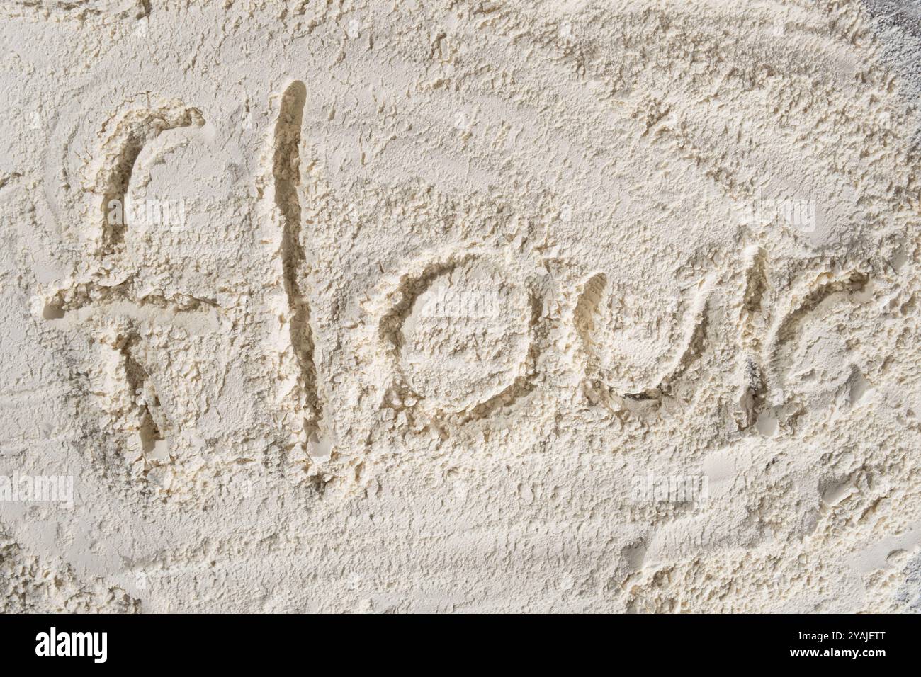 Text flour written on white wheat flour top view Stock Photo - Alamy