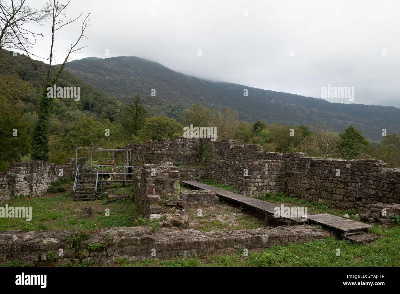 Stone wall at the ruins of the castle of Meduno in the Friuli region ...