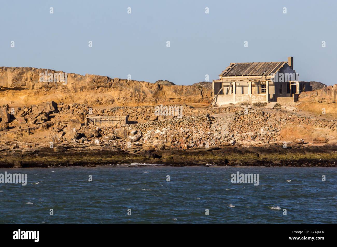Abandoned house on the shores of Halifax Island, small rocky Island ...