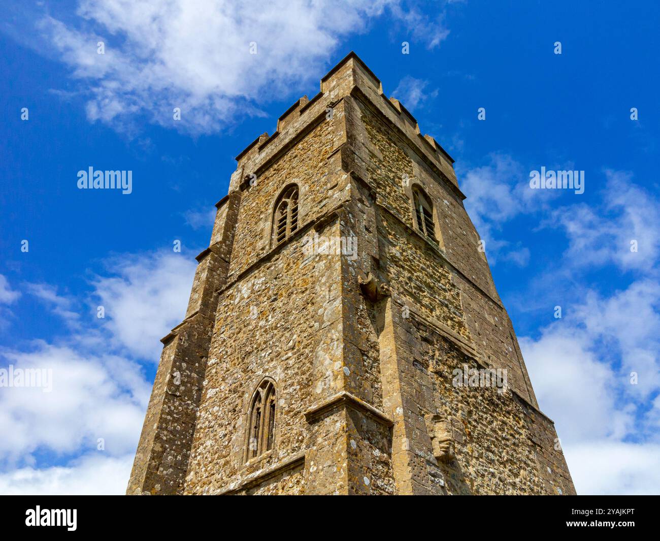 View looking up at the tower of St Michael's Church on Glastonbury Tor ...