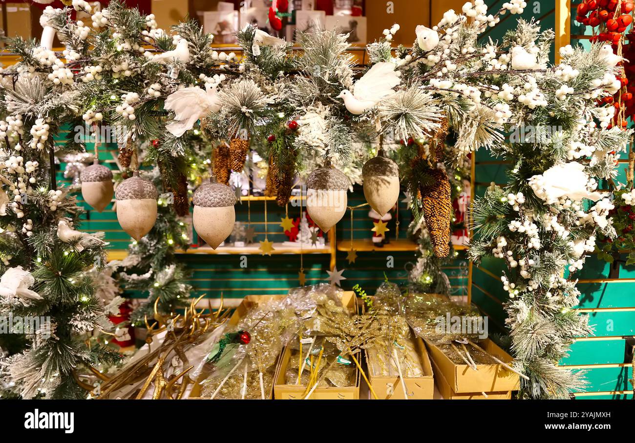 decorated christmas tree in supermarket. store counters with candies ...