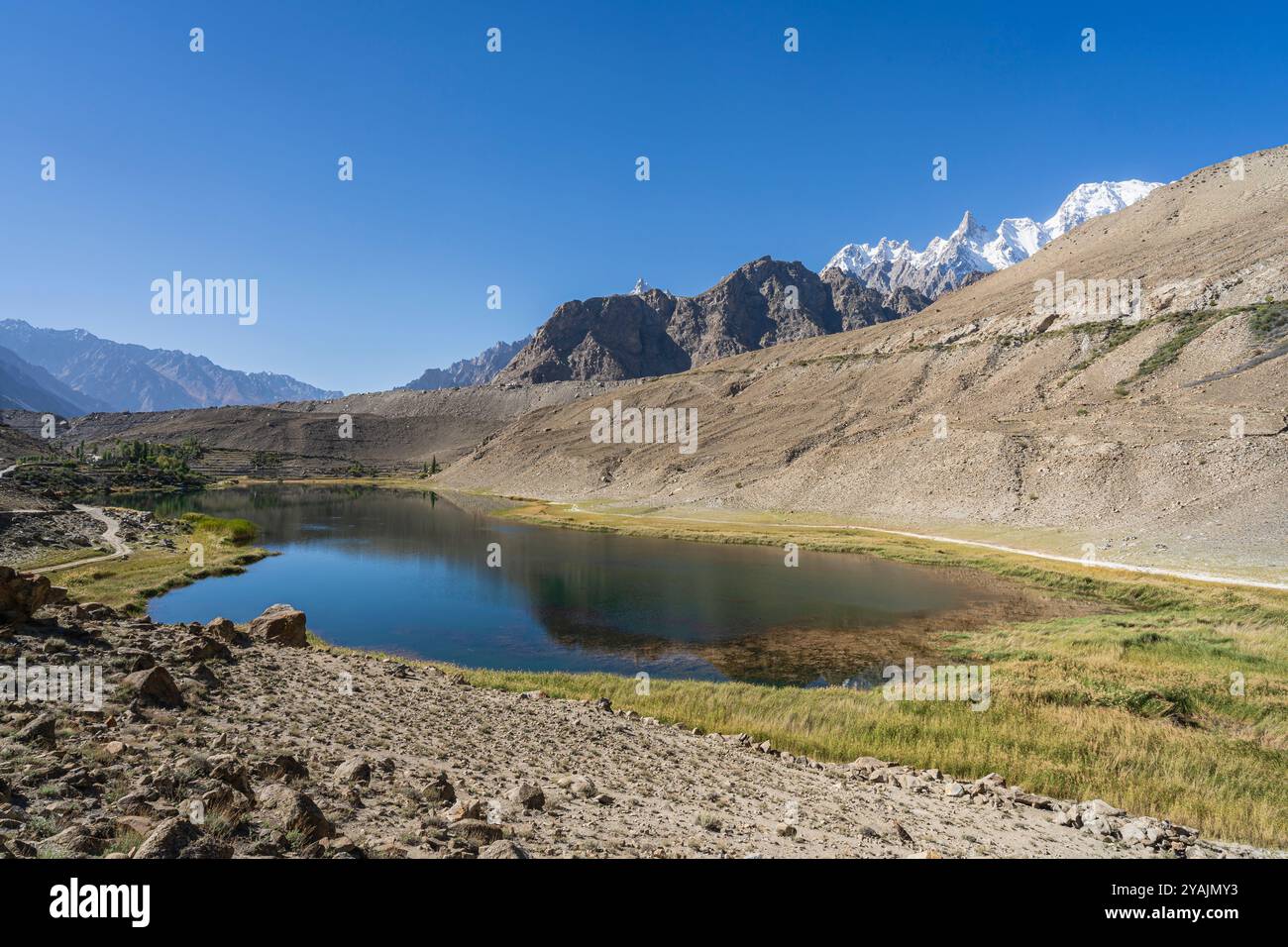 Colorful landscape view of Borith lake with Batura Muztagh mountains in ...