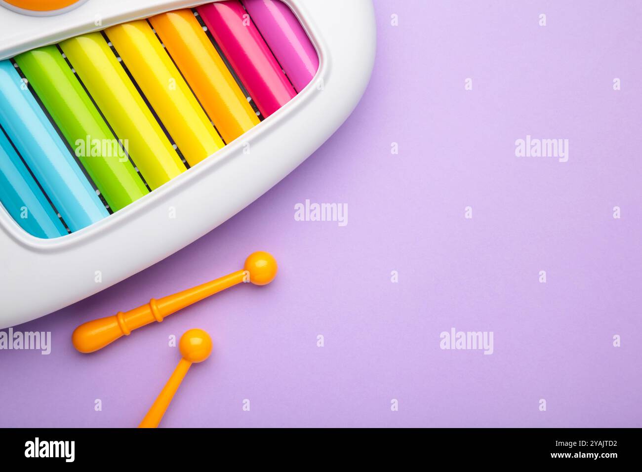 Colorful xylophone on purple background. Space for text. Top view Stock Photo - Alamy