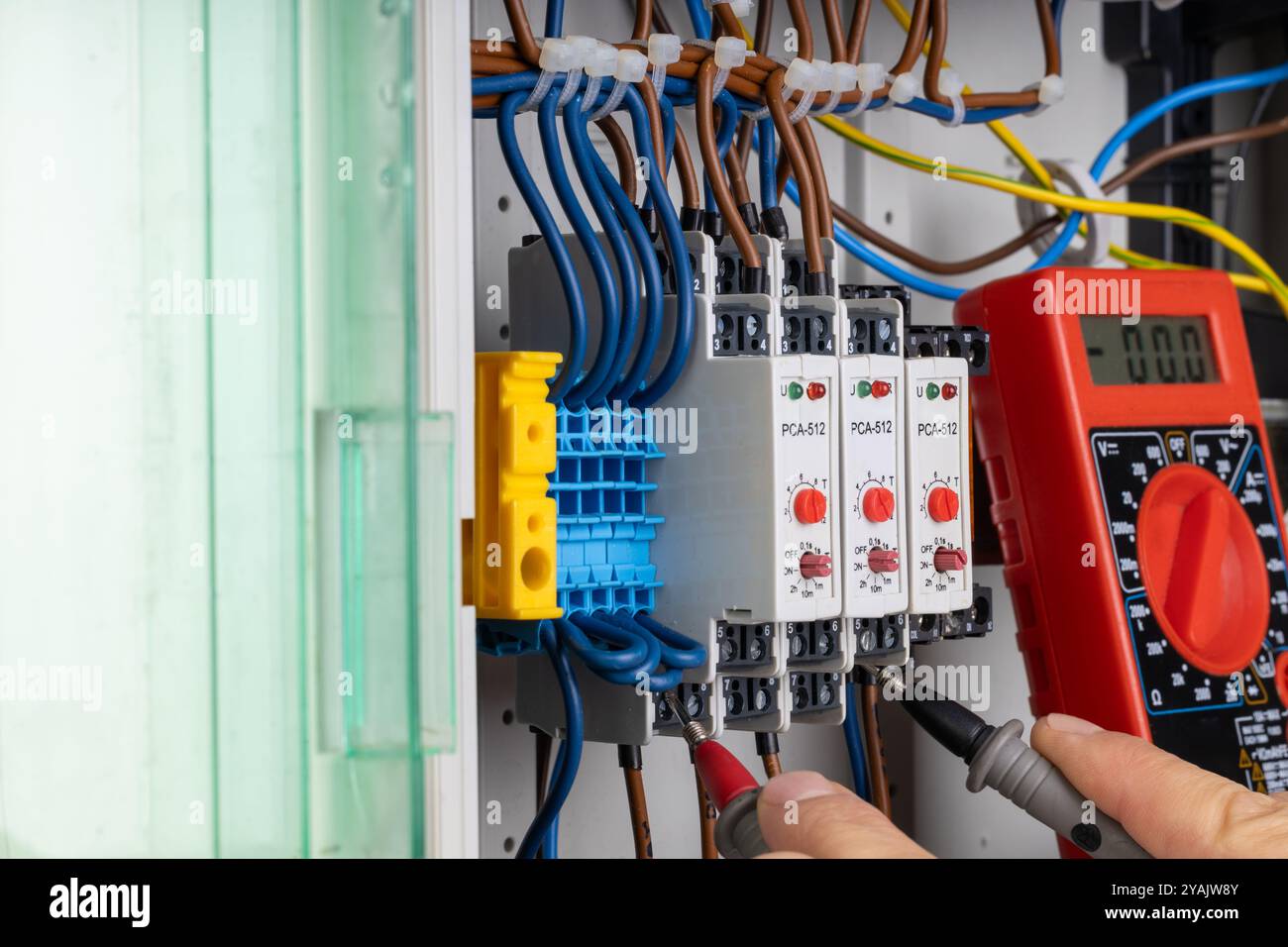 Electrician Testing Circuit Connections with Multimeter Stock Photo - Alamy