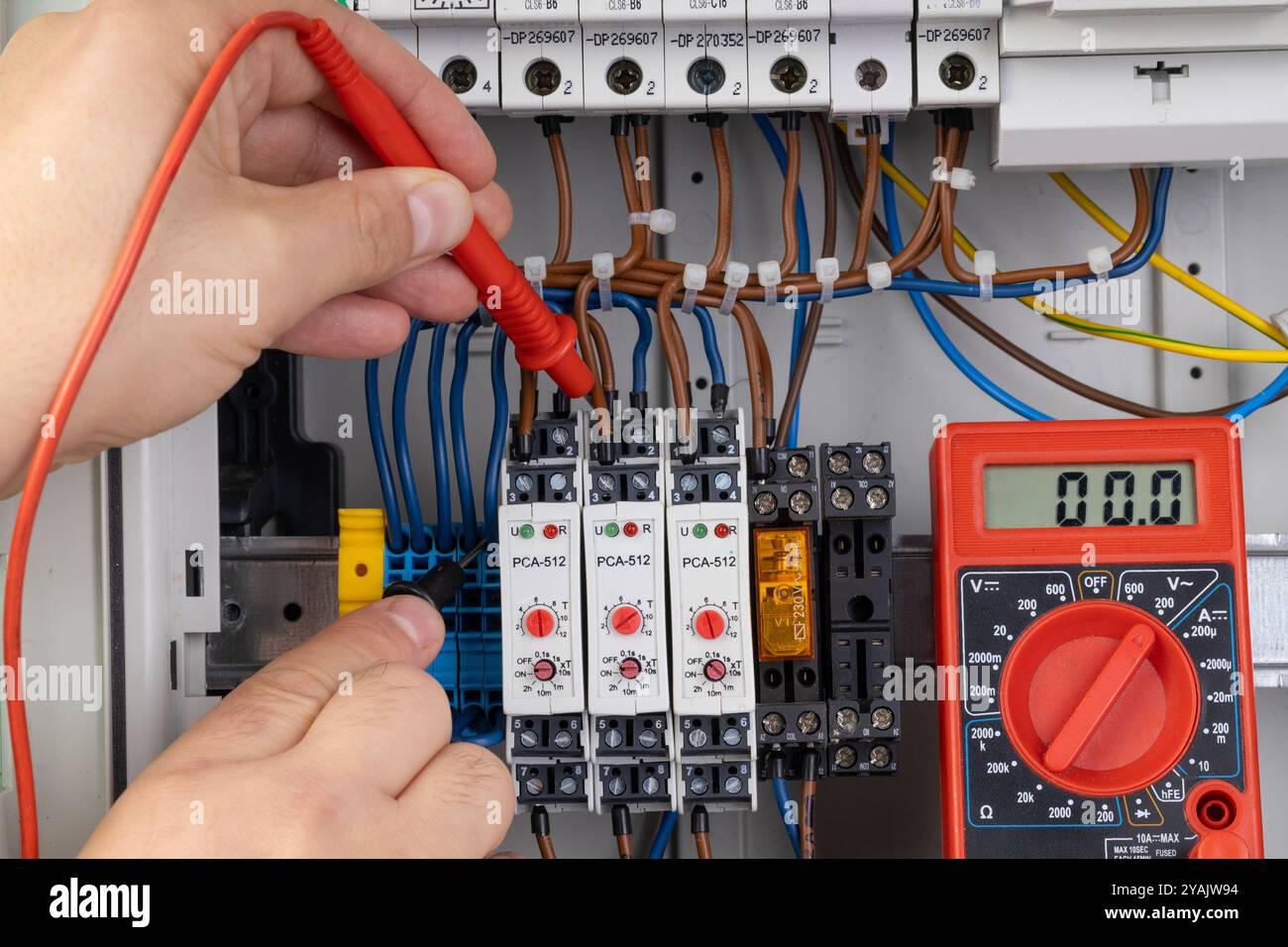 Electrician Using Multimeter to Test Electrical Connections Stock Photo ...