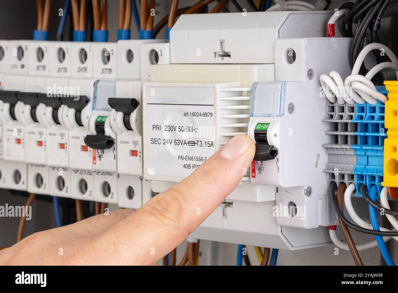 Finger Switching Off Circuit Breaker in Electrical Panel Stock Photo ...