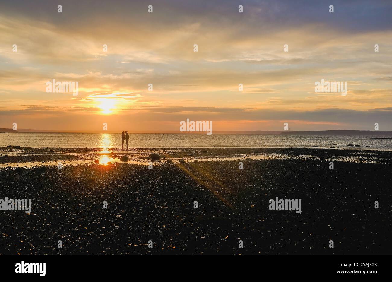 Two adults beach hi-res stock photography and images - Alamy