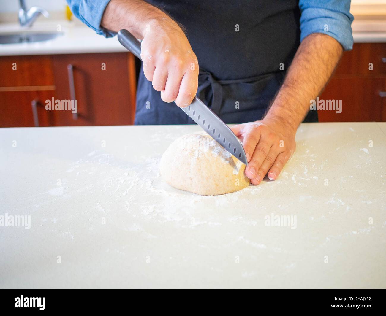 Home cook using knife cut hi-res stock photography and images - Alamy