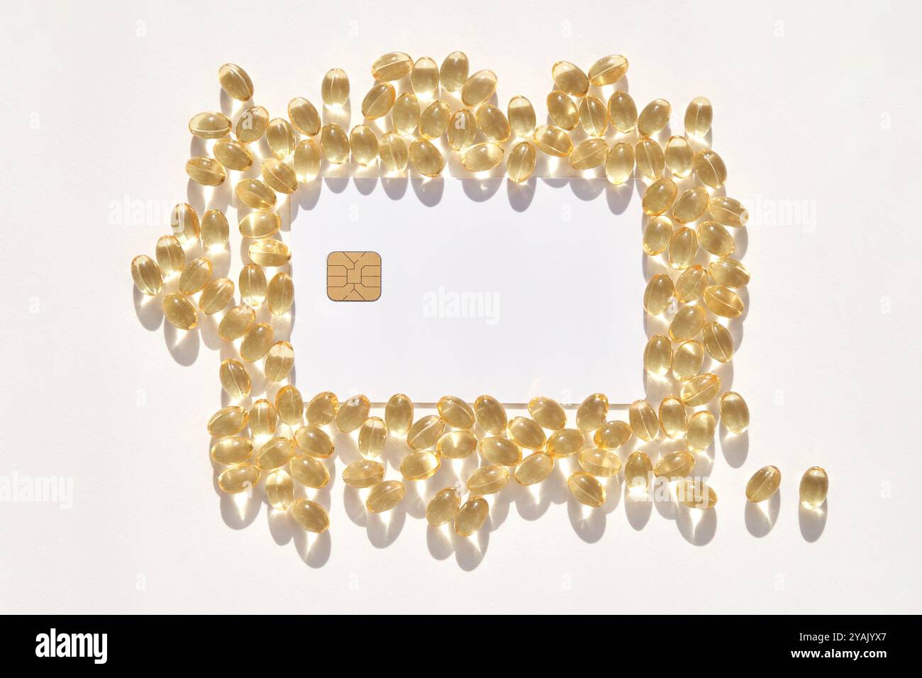 Gold capsules surround a single chip card on white background ...