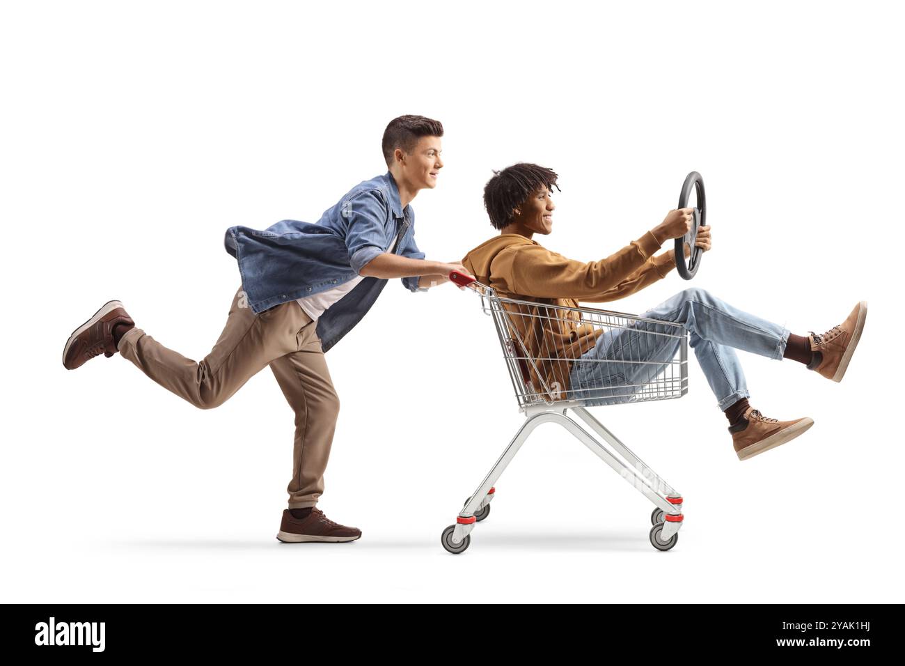 Guy pushing an african american friend inside a shopping cart isolated ...