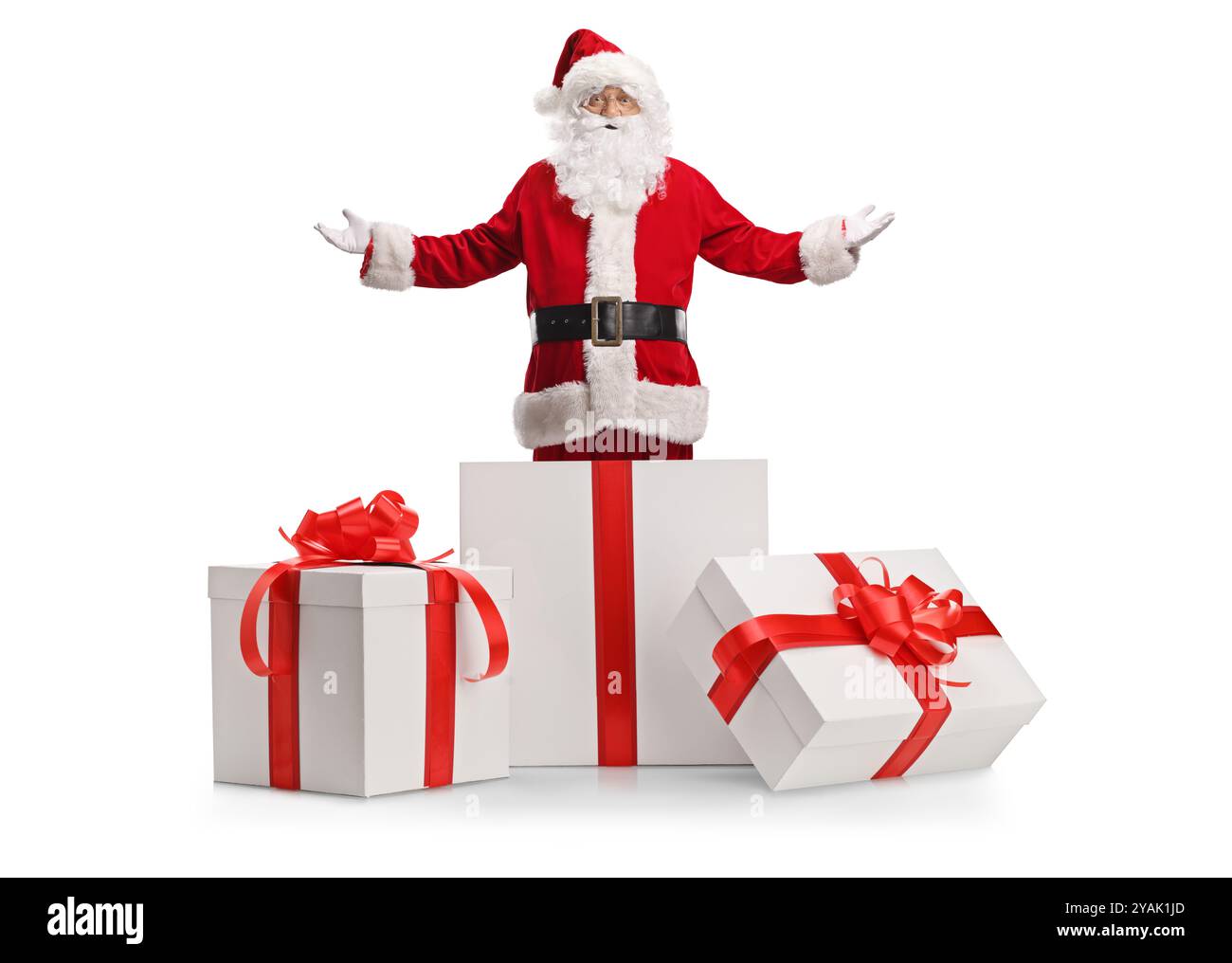 Santa claus standing inside a big gift box isolated on white background ...
