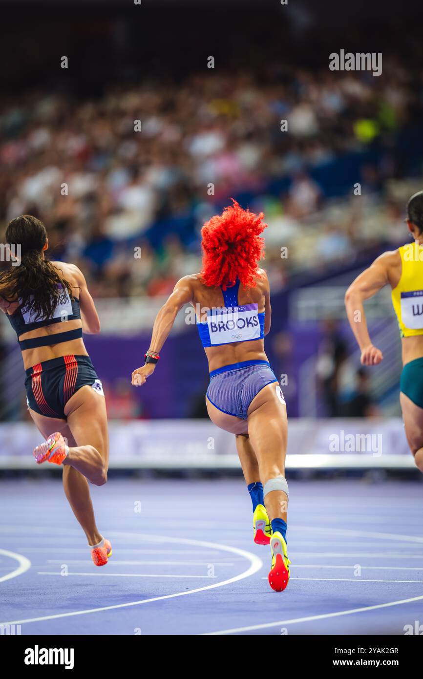 Taliyah Brooks participating in the 200 meters at the Paris 2024 ...