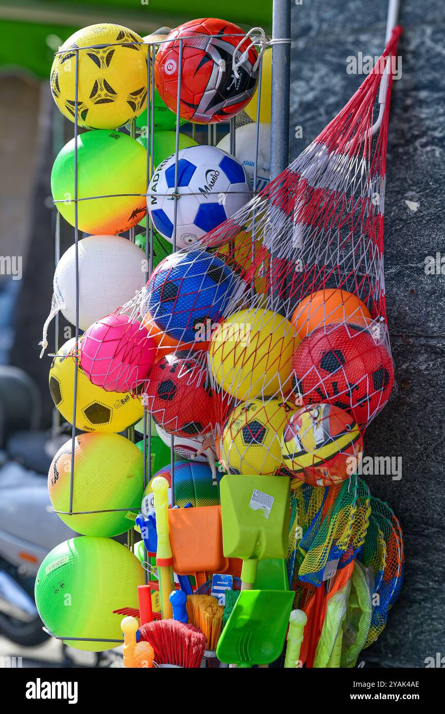 Detail of colorful balloons displayed in front of a tourist shop on the ...