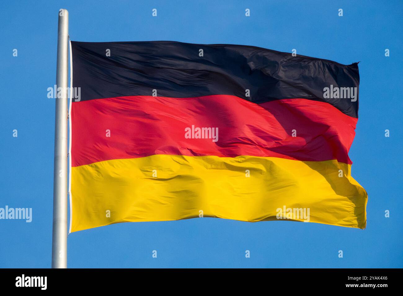 Flag germany waving in wind hi-res stock photography and images - Alamy