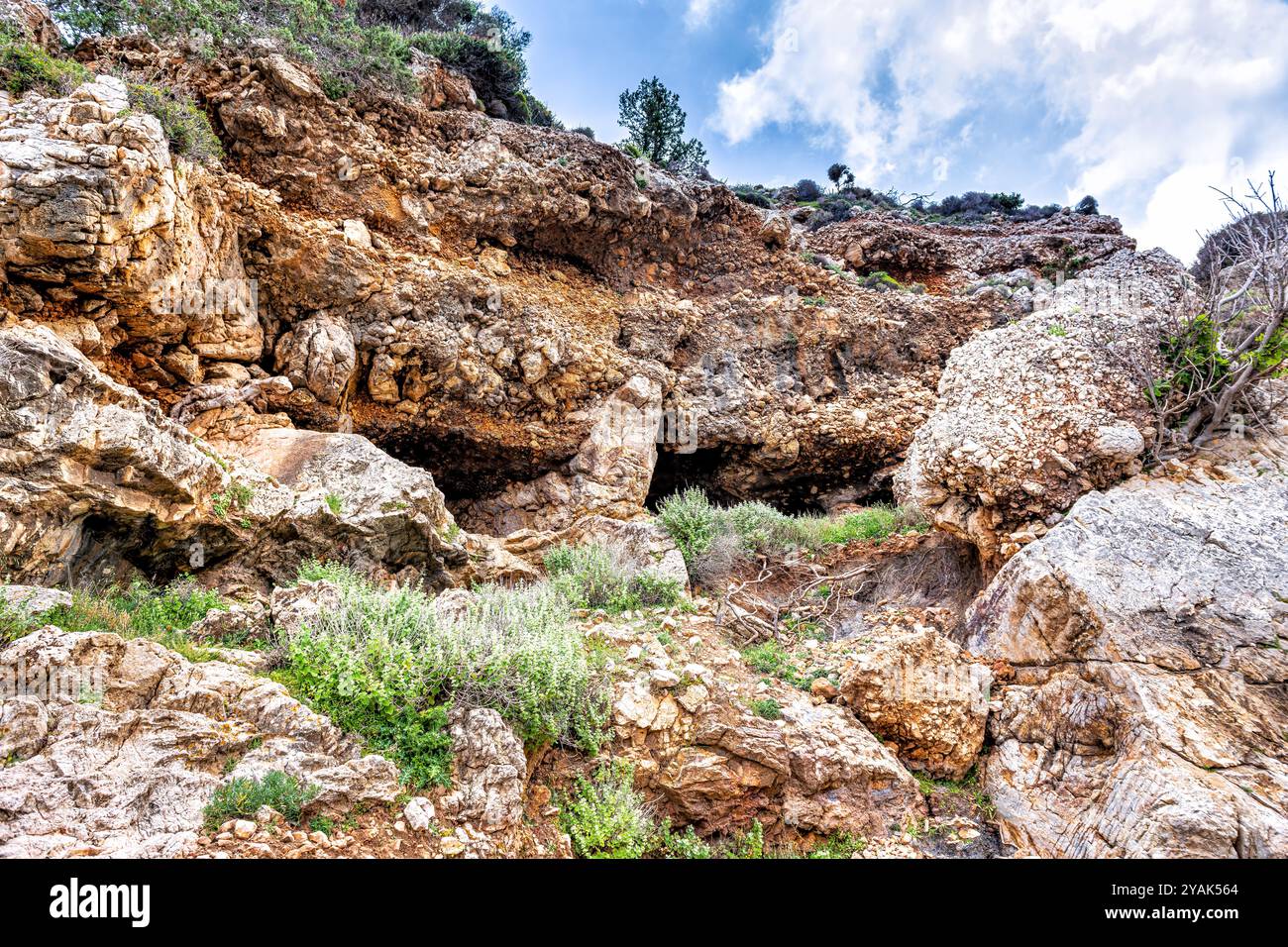 Dionysos cave temple by Iero beach on Ikaria island, Greece rocky ...