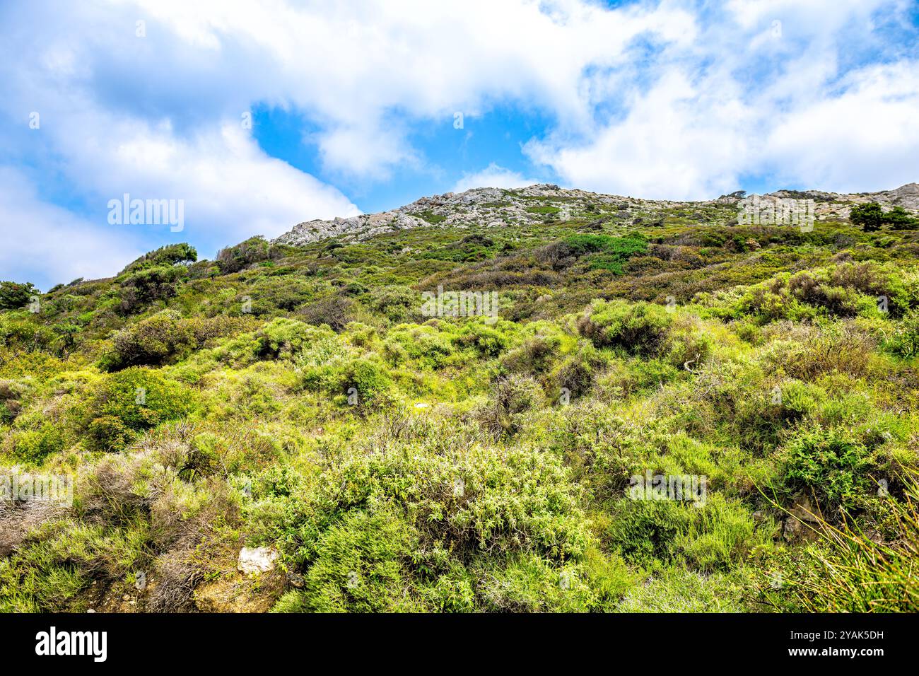 Mountains, rolling hills near Faros of Ikaria island in Greece by ...