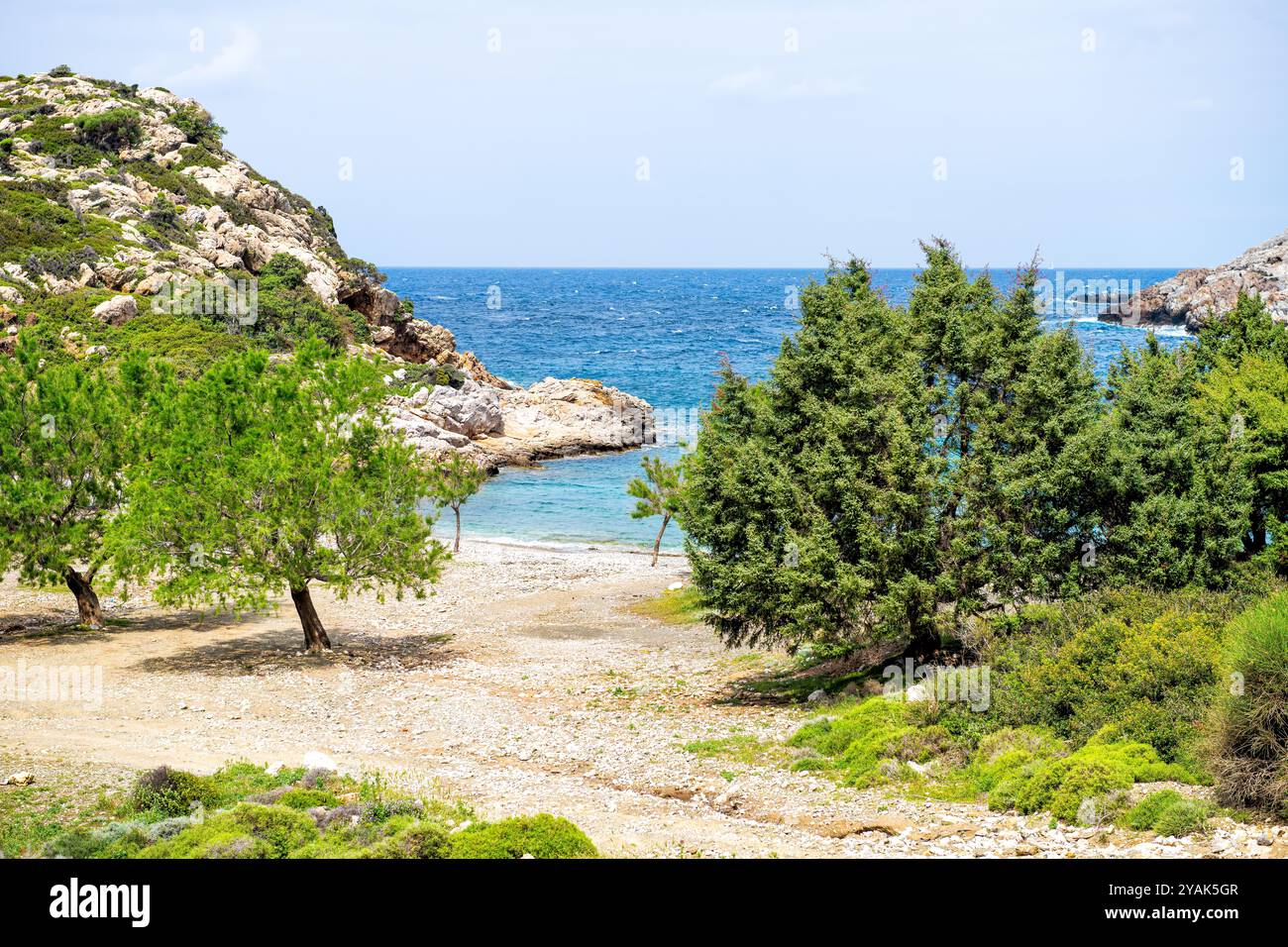Iero beach, Ikaria island Greece cove with Ikarian sea waves washing on ...
