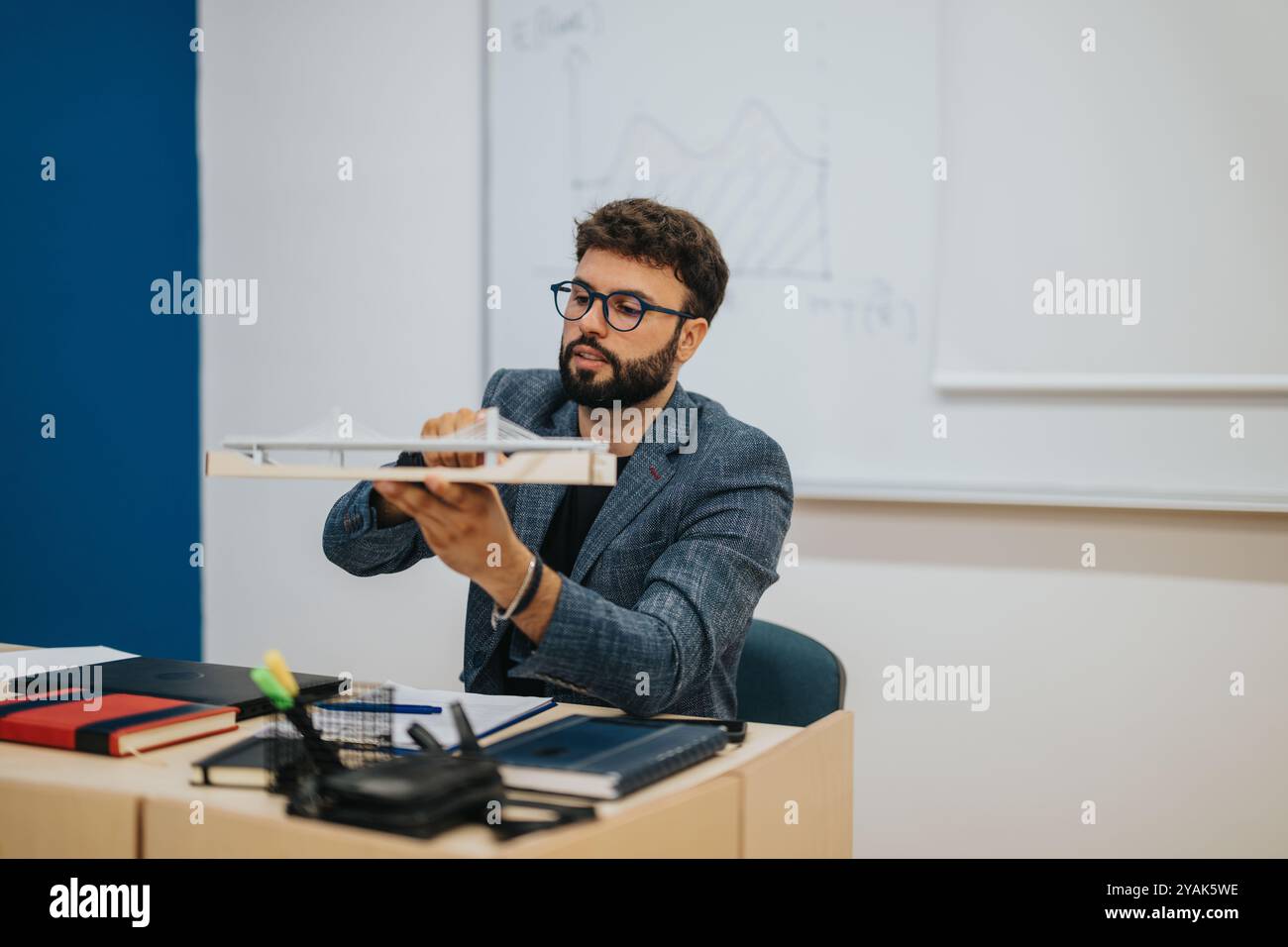 Teacher explaining project model hi-res stock photography and images ...
