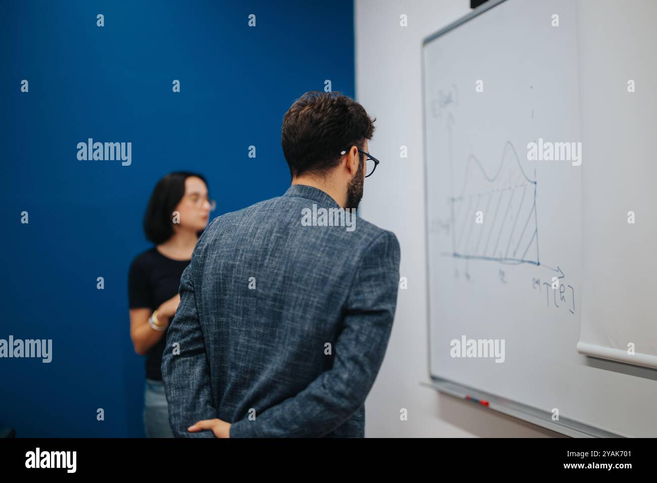 Students present graph at school using whiteboard Stock Photo - Alamy