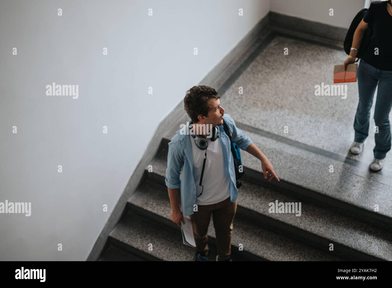 College students walking up steps hi-res stock photography and images ...