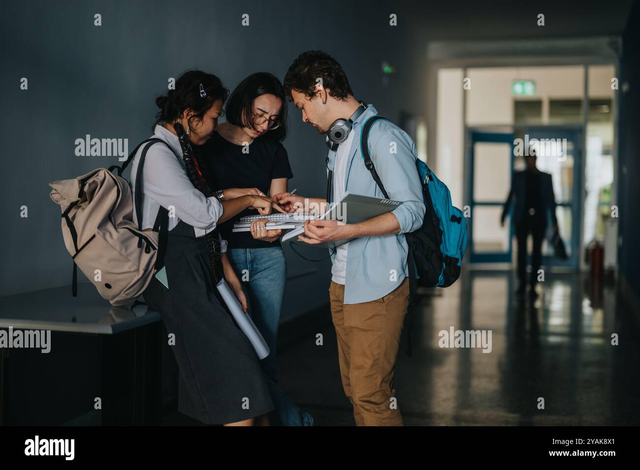 Diverse group teenagers collaborating hi-res stock photography and ...