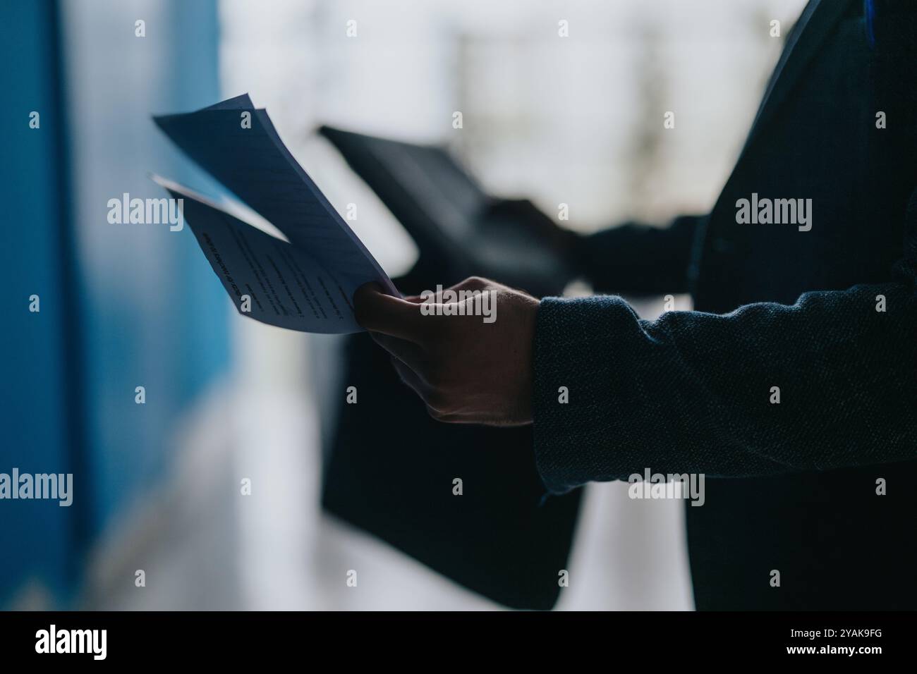 Students discussing academic topics with professor between classes ...