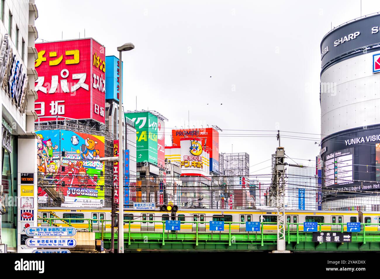 Colorful signs and neon signs at the skyscrapers hi-res stock ...