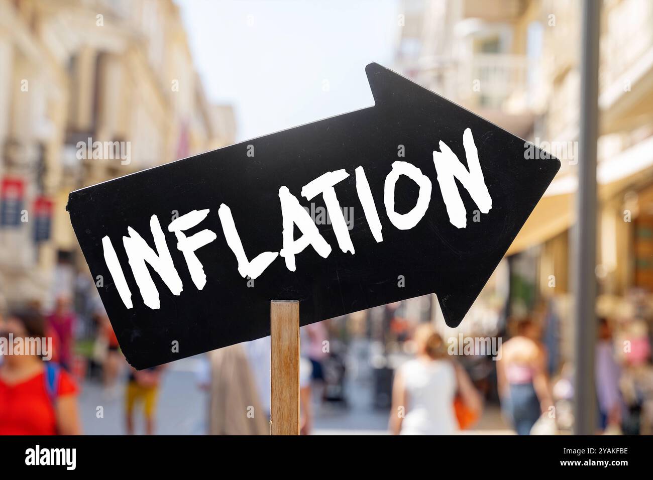 14 October 2024: Sign with an arrow pointing upwards in a pedestrian ...