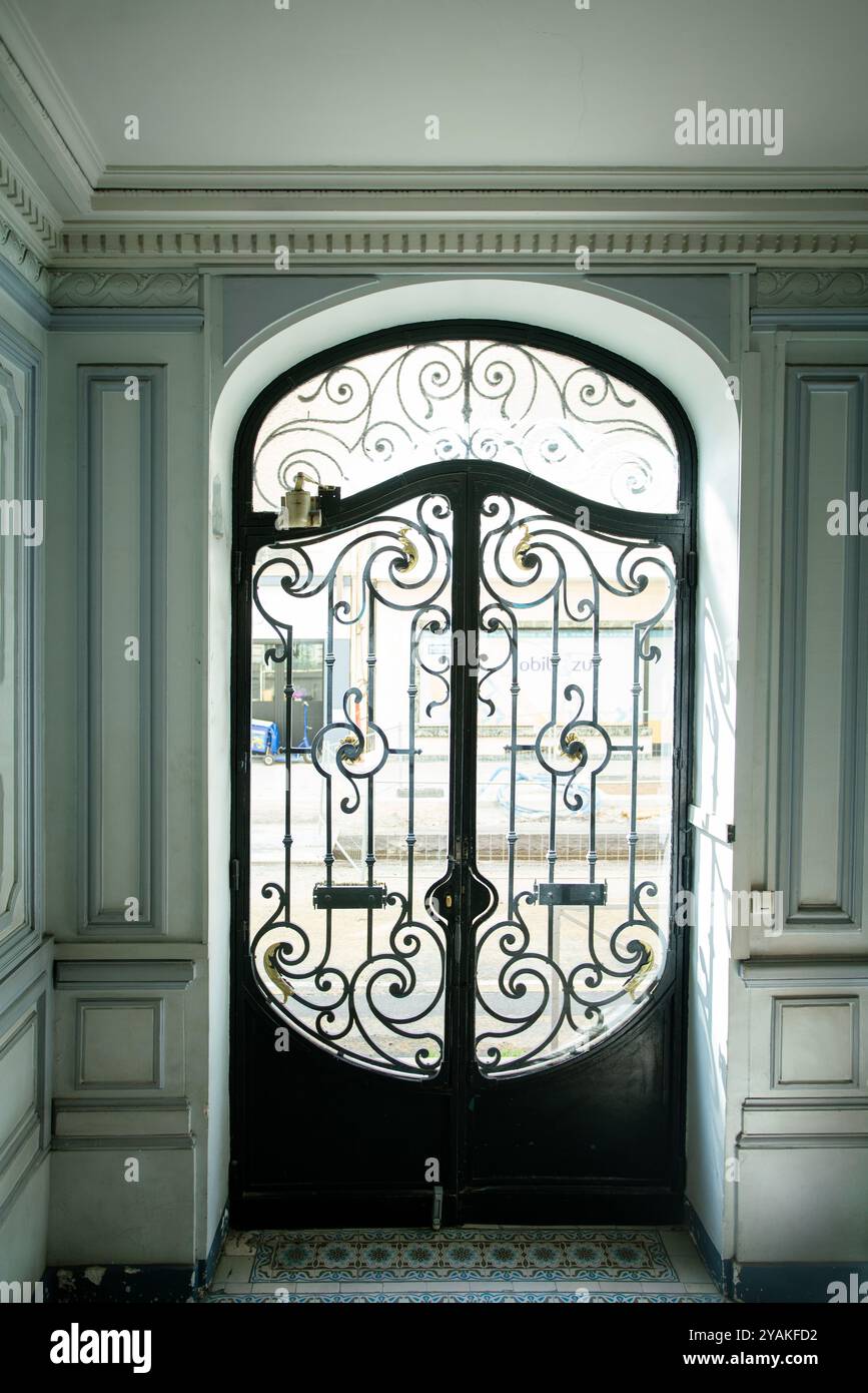 Metal entrance door of curved form with liquid damper of curved "old ...