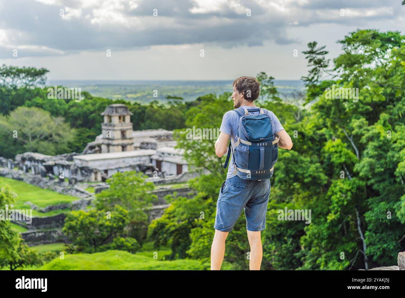 Man tourist exploring the ancient pyramids of Palenque, Mexico ...