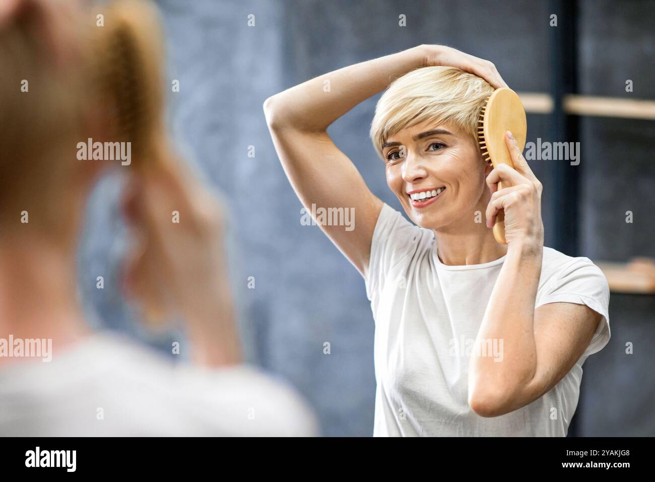 Woman beautiful hair hands in comb hi-res stock photography and images ...