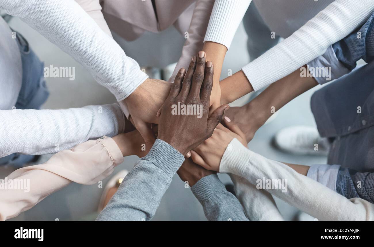 International business team putting hands together in cooperation Stock ...