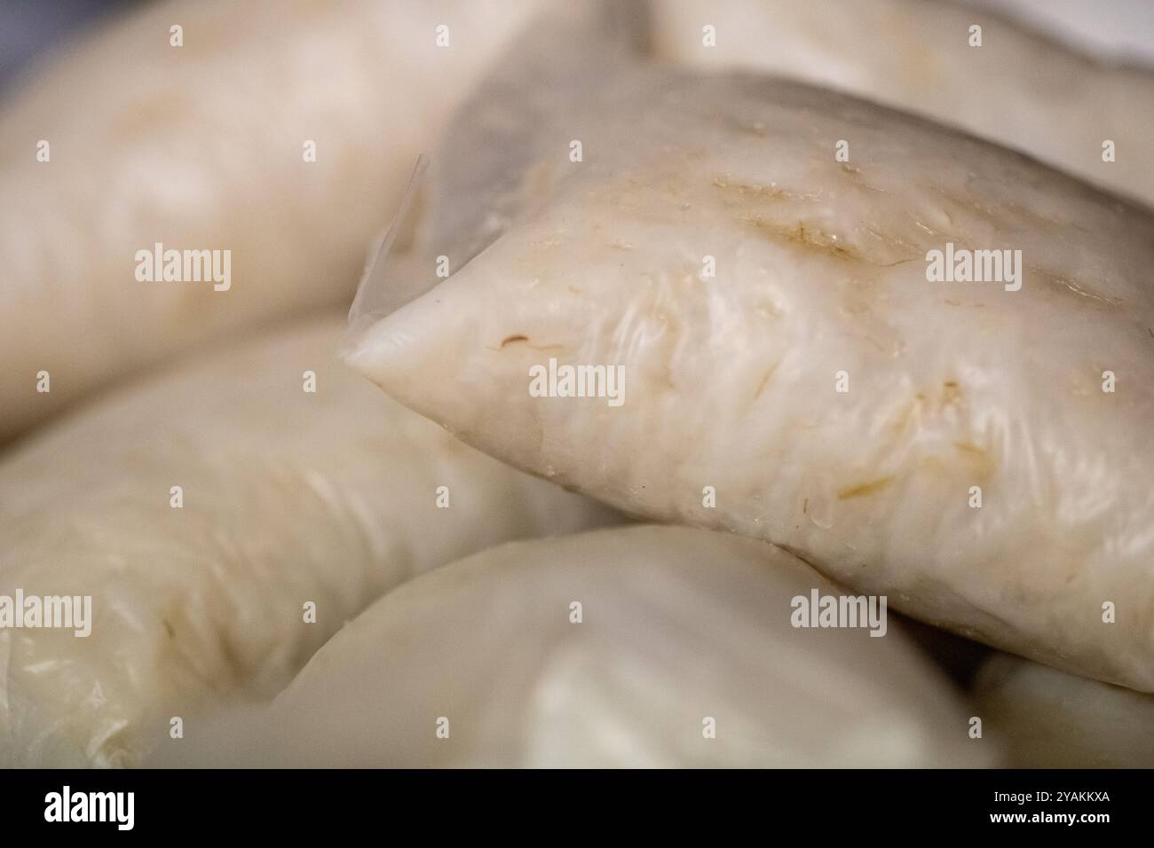 Steamed compressed rice that hasn't been sliced Stock Photo - Alamy