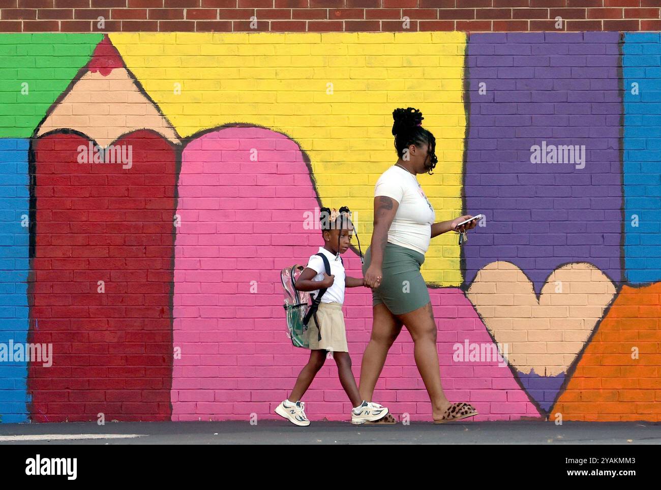 FILE - Bria Gibbs brings her daughter Tai'la Harris, 4, into Columbia ...