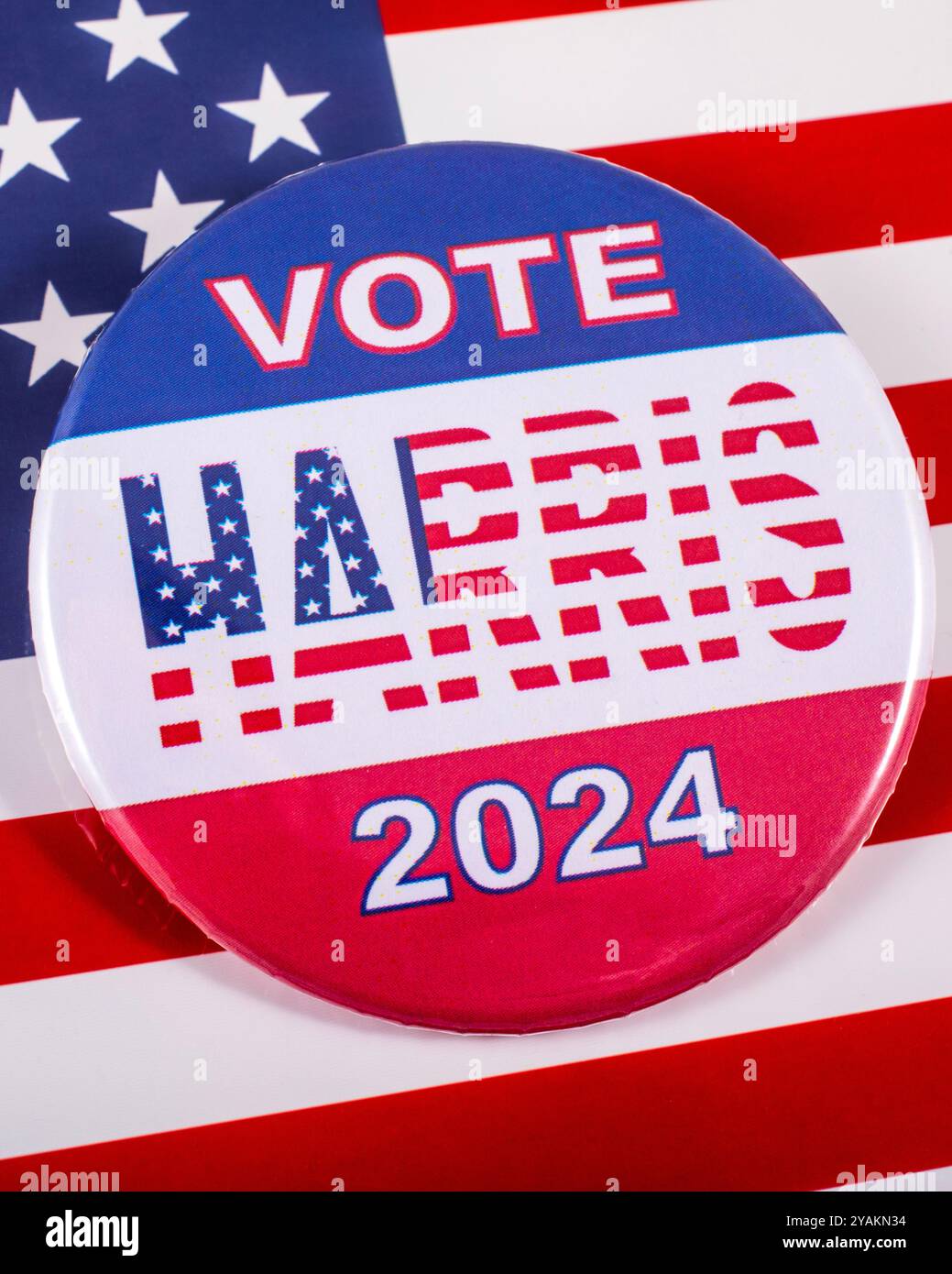 London, UK - September 30th 2024: A Vote Harris 2024 pin badge ...