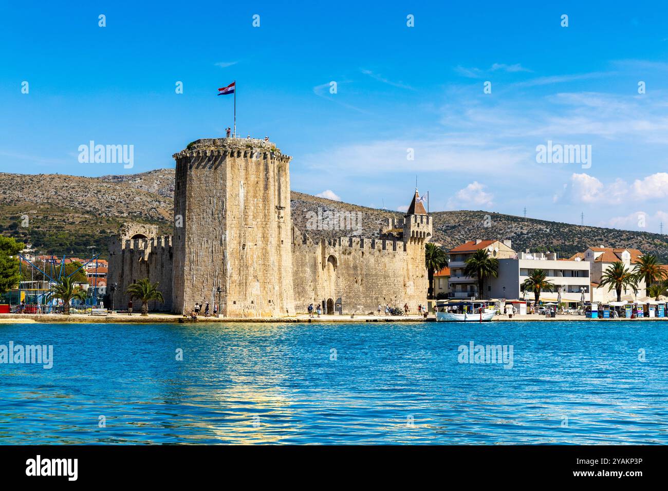 Exterior of 15th century Kamerlengo Castle (Kula Kamerlengo) at sunset ...