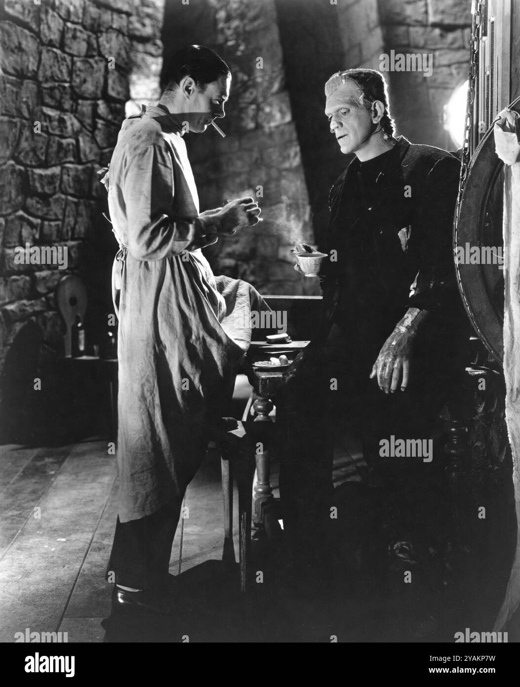 British Actors COLIN CLIVE and BORIS KARLOFF have a tea break on the set of THE BRIDE OF ...