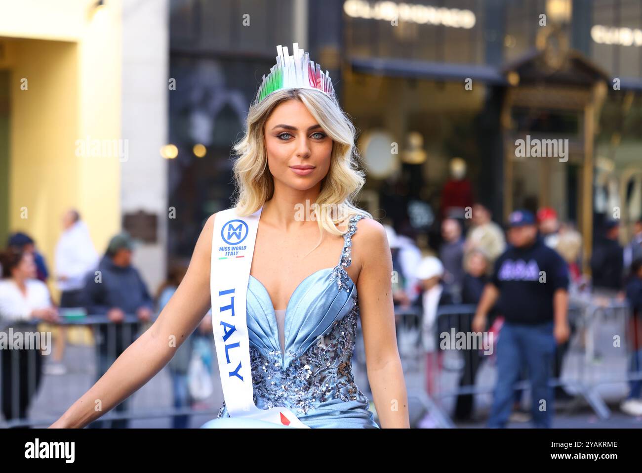 Miss World Italy Lucrezia Mangilli waves to crowds while heading up 5th ...