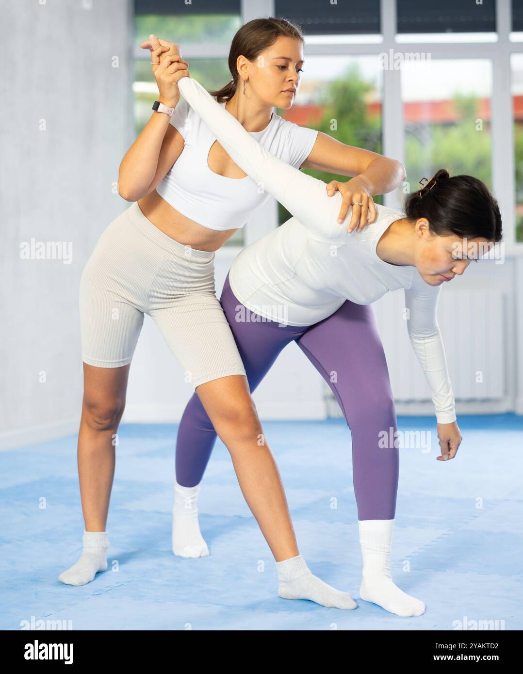 Two young women training self-defense techniques Stock Photo - Alamy