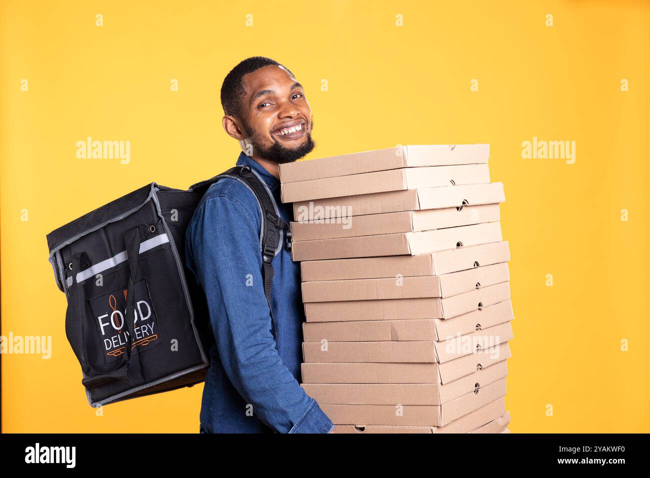 Young adult delivering big pile hi-res stock photography and images - Alamy