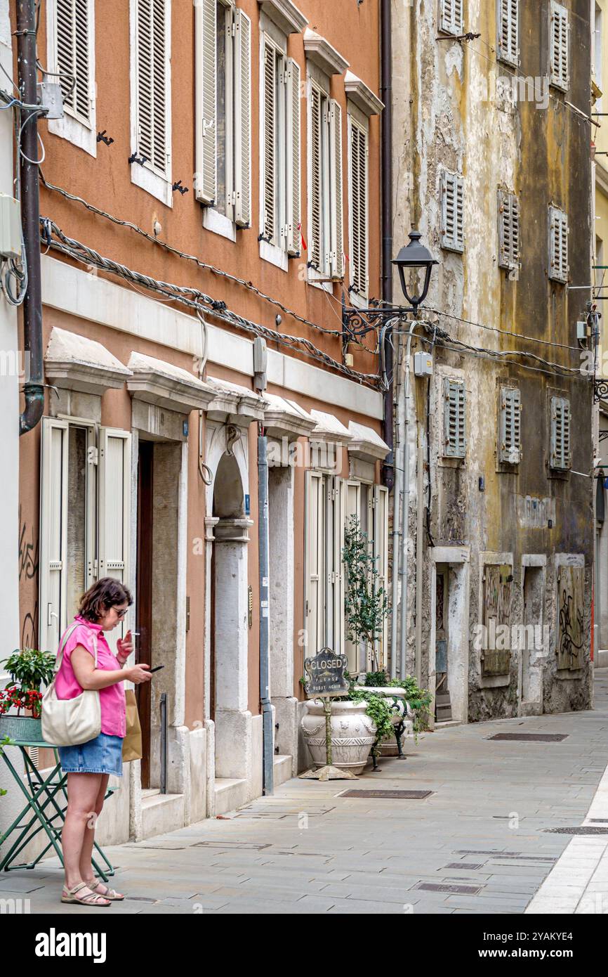 Trieste Italy,outside exterior,residential apartment buildings,woman ...