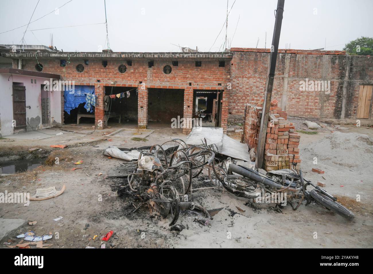 BAHARAICH, INDIA - OCTOBER 14: Vehicles burned by angry mob after a ...